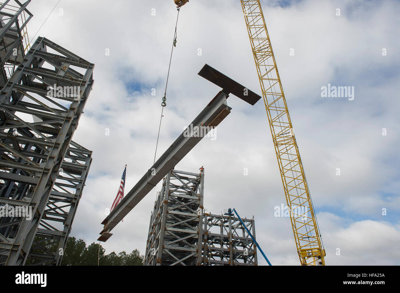 At NASA's Marshall Space Flight Center, a 900-pound steel beam is ...