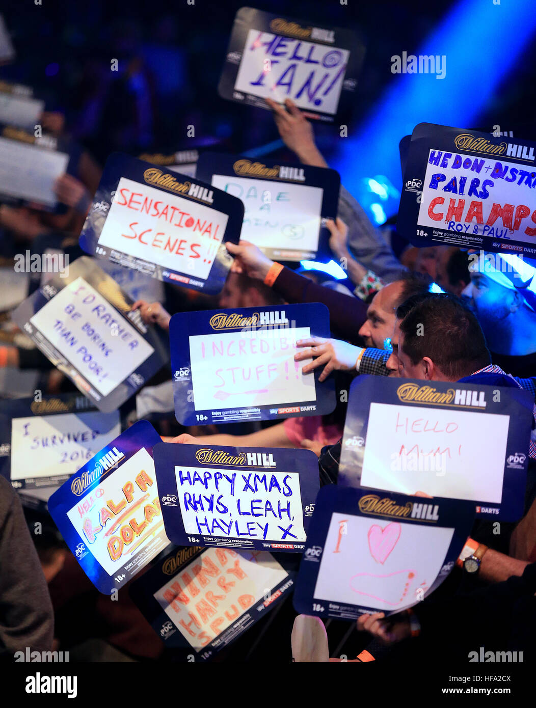 Darts fans holding William Hill 180 cards during day eleven of the ...