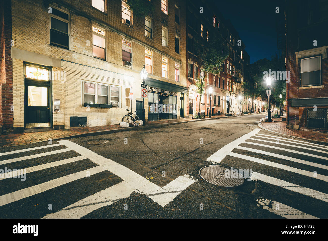Intersection and historic buildings at night, in Beacon Hill, Boston ...