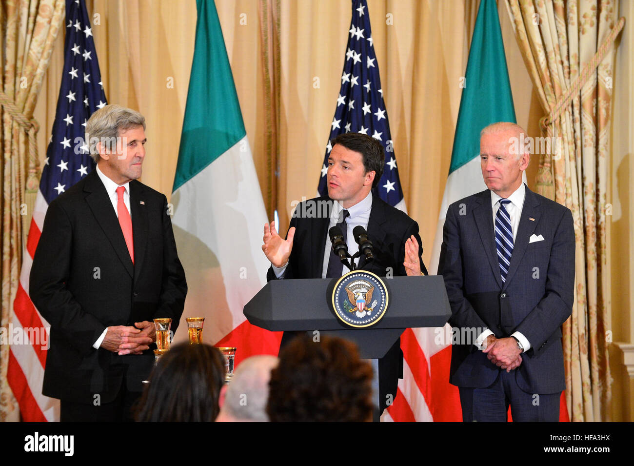 Flanked by U.S. Secretary of State John Kerry and U.S. Vice President ...