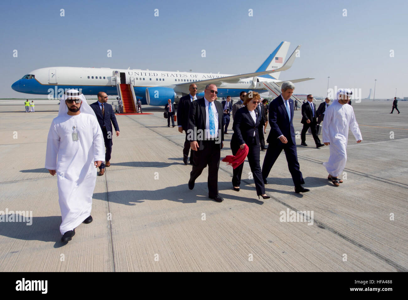 U.S. Secretary of State John Kerry walks with U.S. Ambassador to the ...