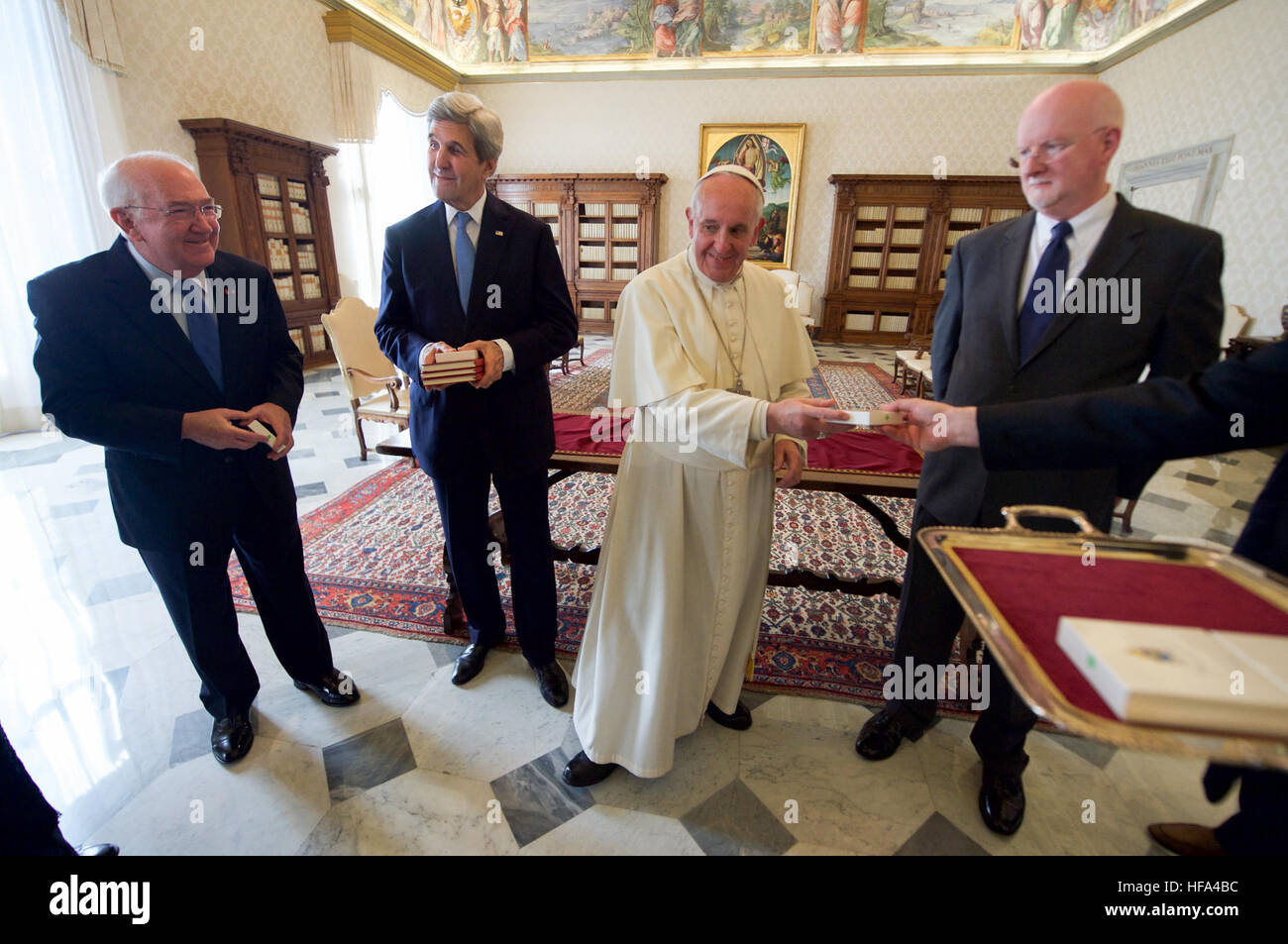 U.S. Ambassador to the Holy See Kenneth Hackett looks on as Pope ...