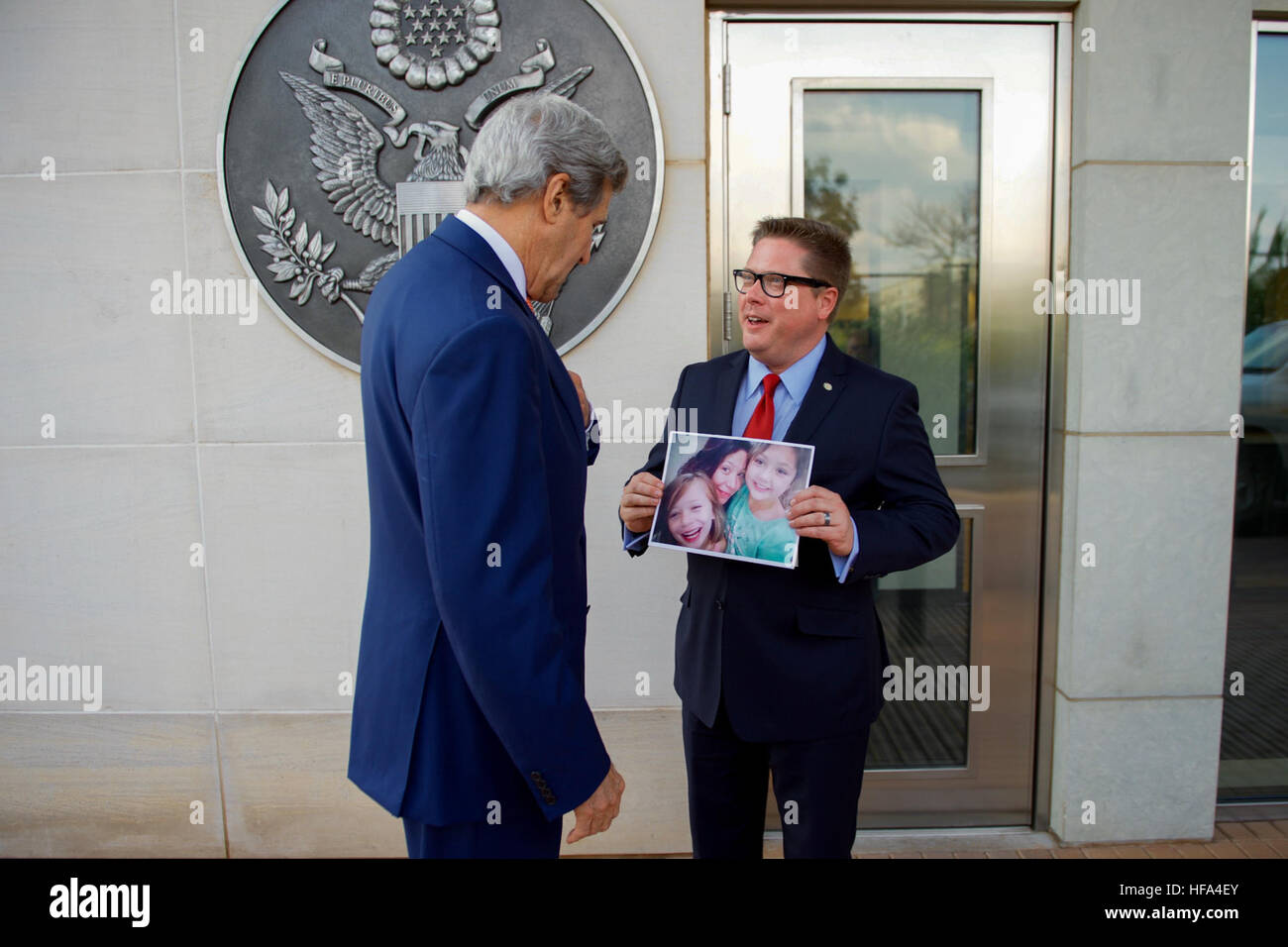 U.S. Embassy Deputy Chief of Mission Matt Roth shows U.S. Secretary of ...