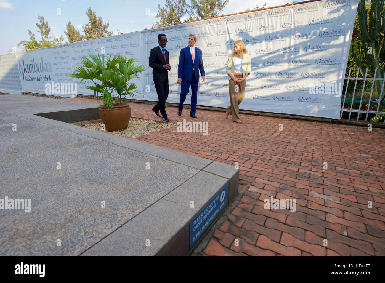 U.S. Secretary of State John Kerry, flanked by U.S. Ambassador to ...