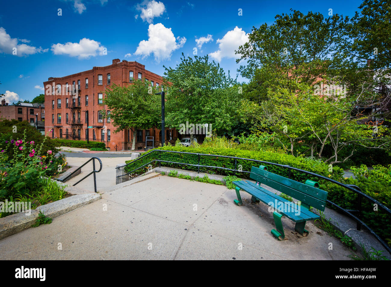 Walkway and bench at Southwest Corridor Park in Back Bay, Boston ...