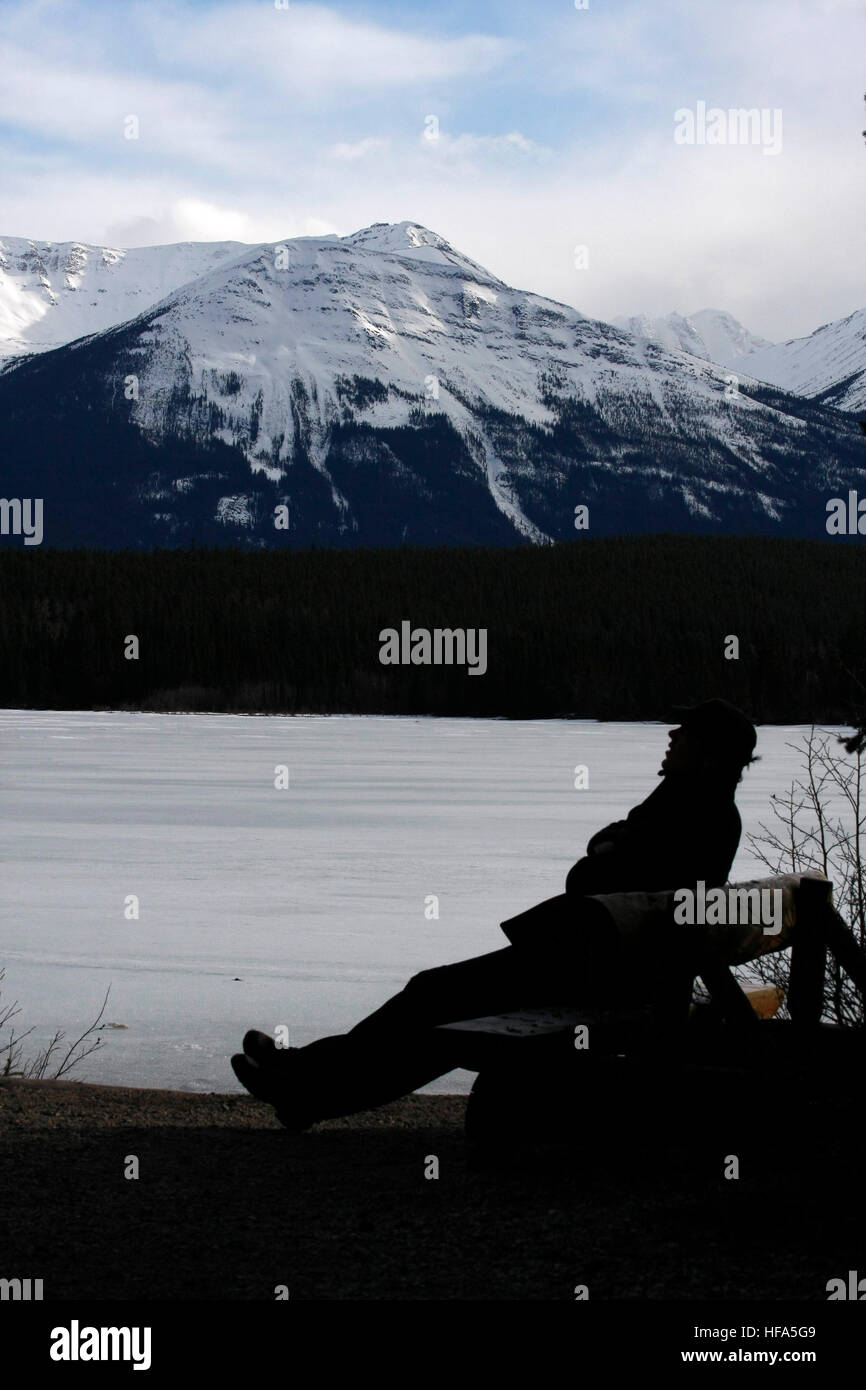 Chilling by the frozen lake Stock Photo - Alamy