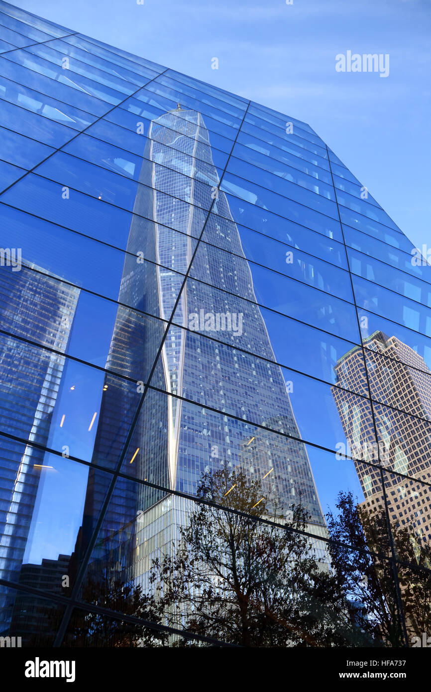 The Freedom Tower in New York City reflecting in the mirrored facade of ...