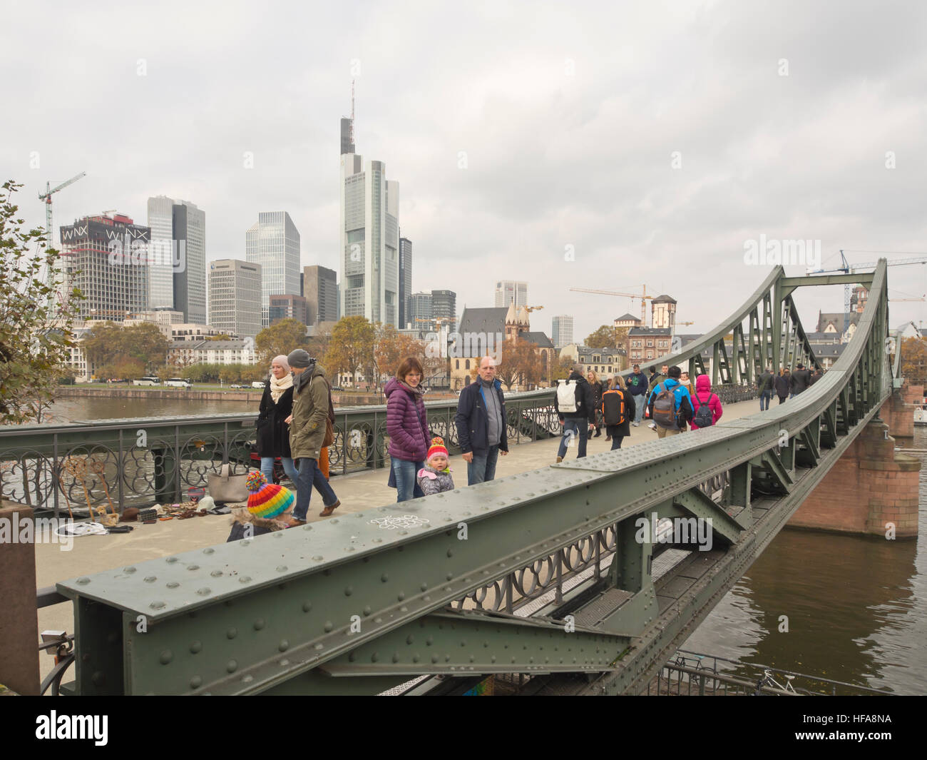 Eiserner Steg an iron footbridge leading across the river Main in Frankfurt Hesse Germany steel ...