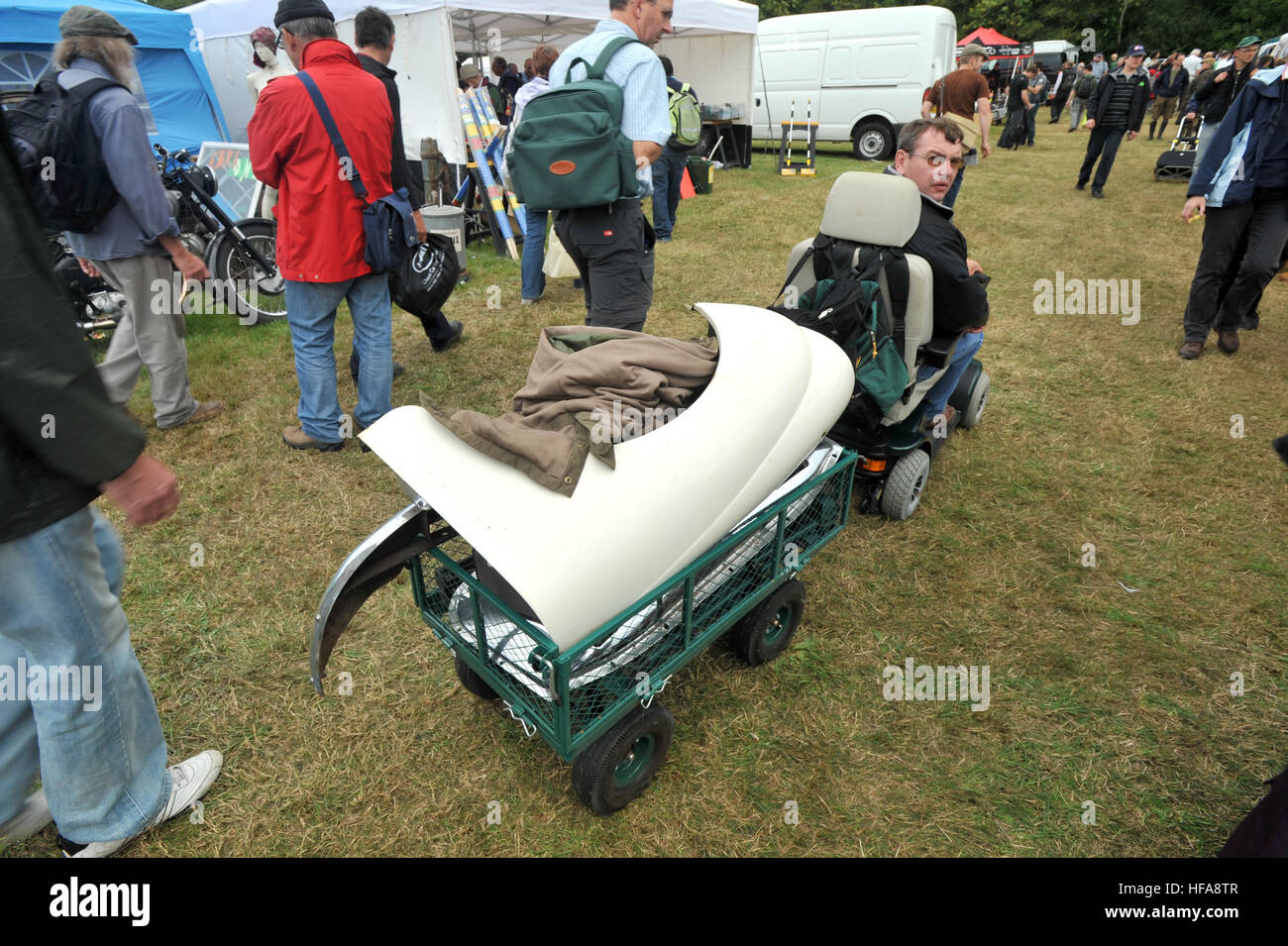 Classic car owners look through stalls of rare parts and automobilia at ...