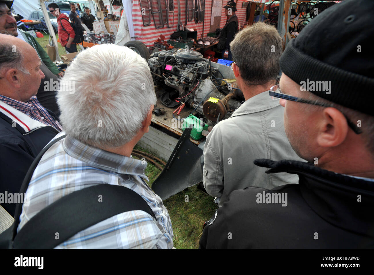 Classic car owners look through stalls of rare parts and automobilia at ...