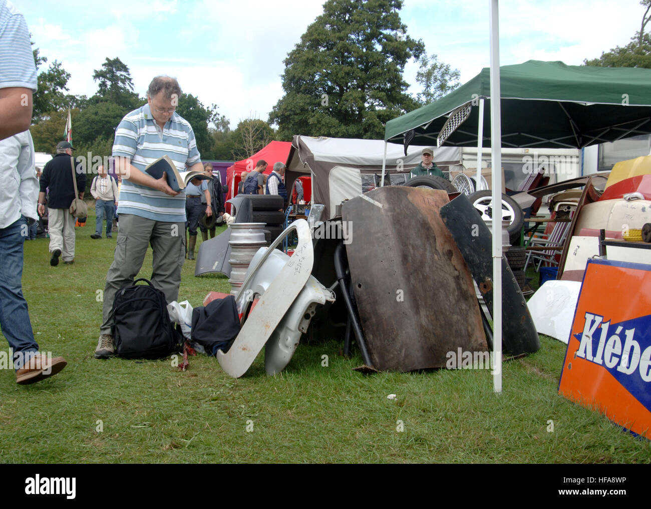 Classic car owners look through stalls of rare parts and automobilia at ...