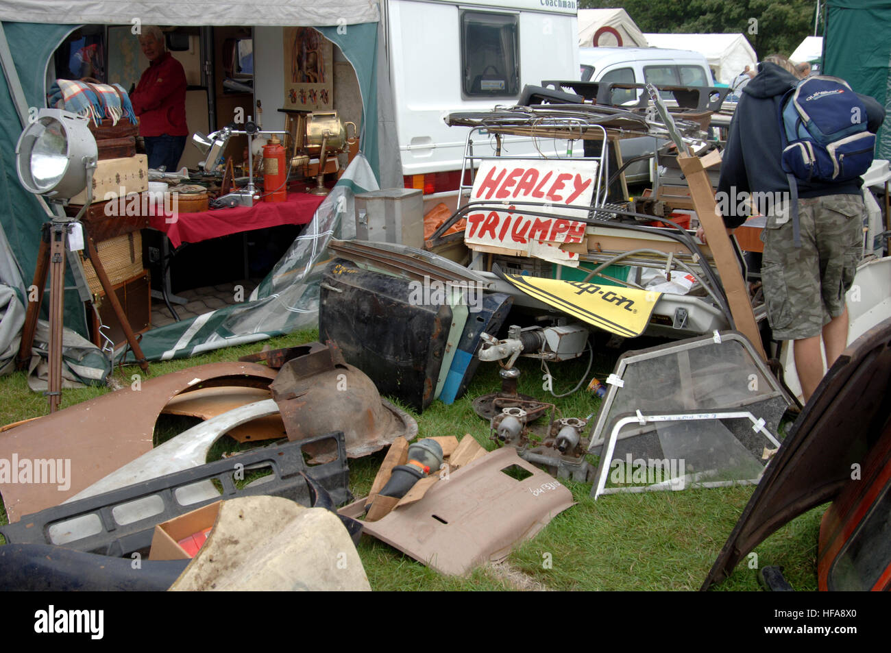 Classic car owners look through stalls of rare parts and automobilia at ...