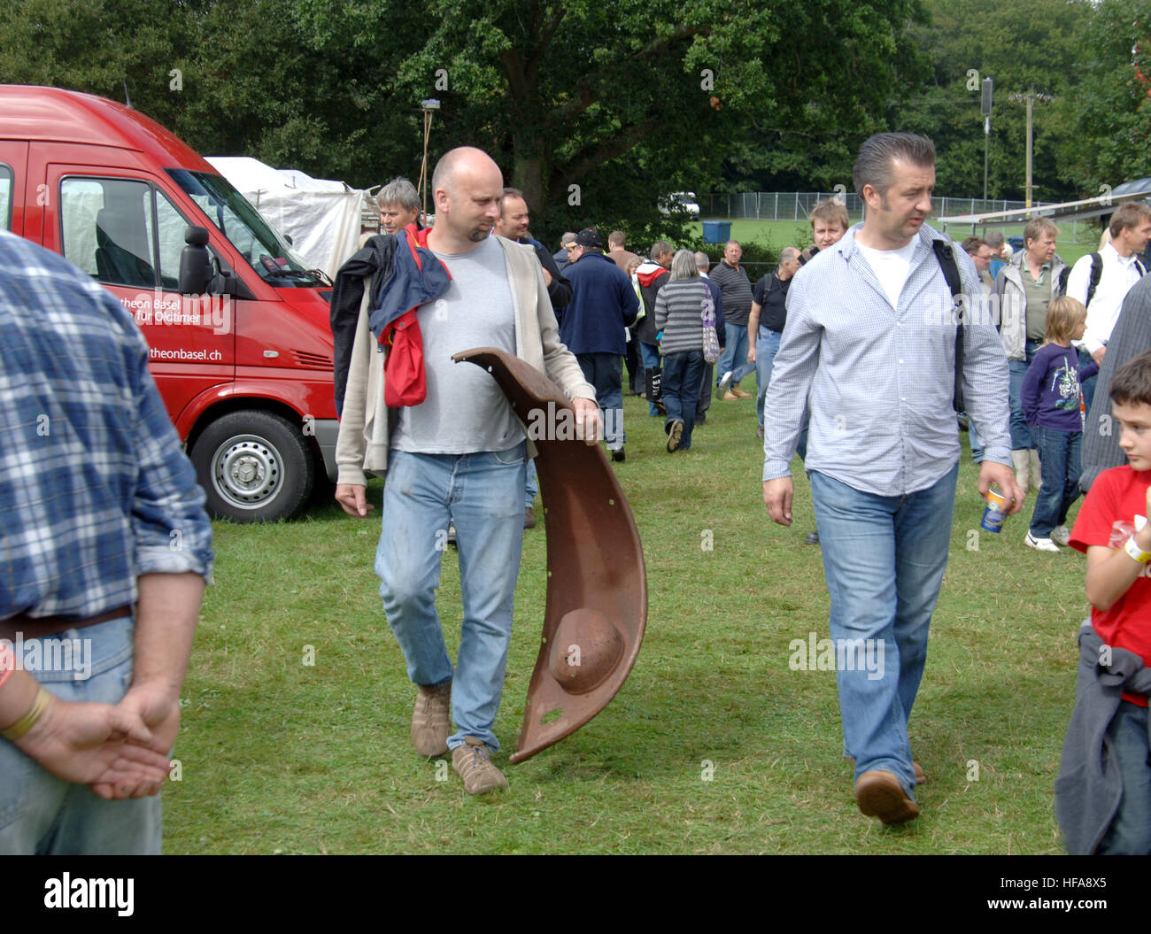 Classic car owners look through stalls of rare parts and automobilia at ...