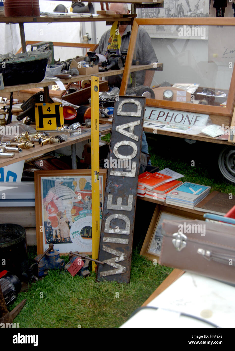 Classic car owners look through stalls of rare parts and automobilia at ...