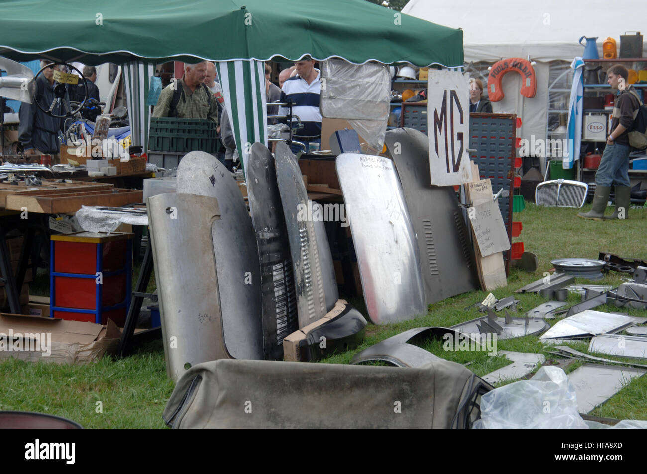 Classic car owners look through stalls of rare parts and automobilia at ...