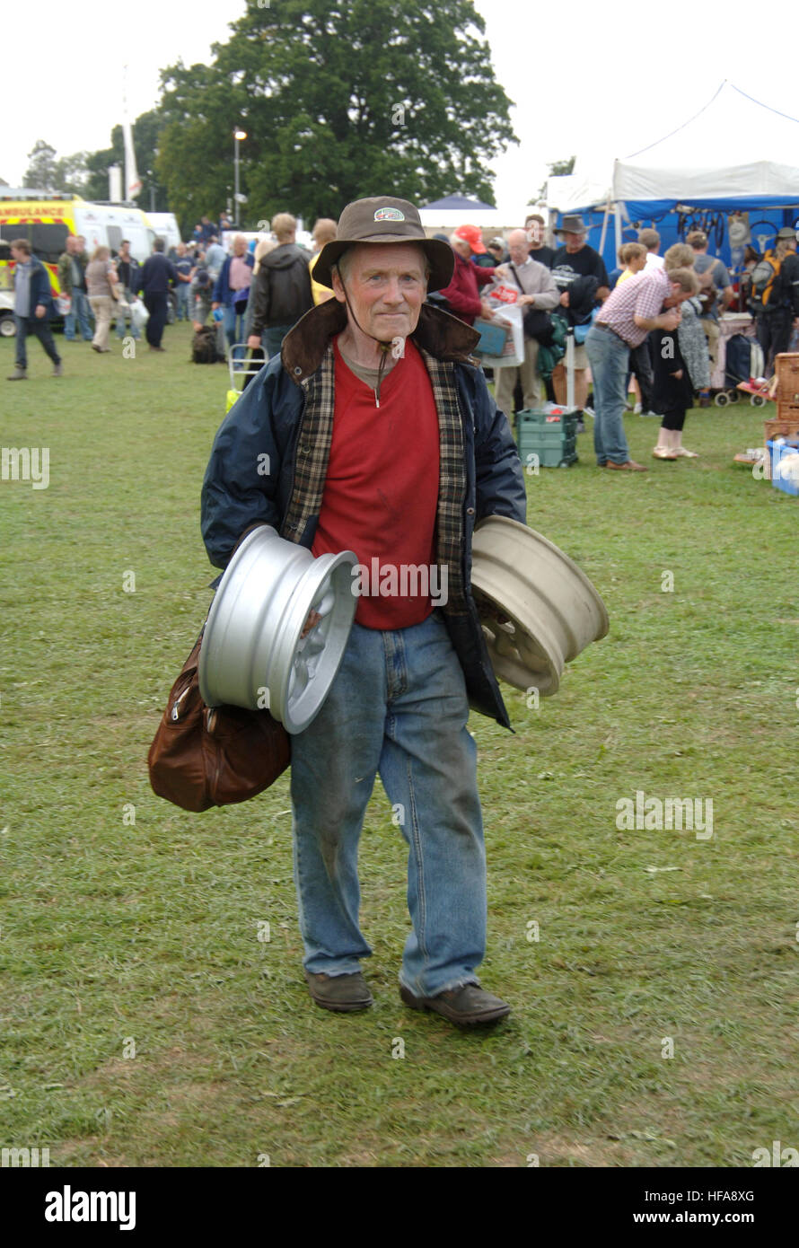 Classic car owners look through stalls of rare parts and automobilia at ...