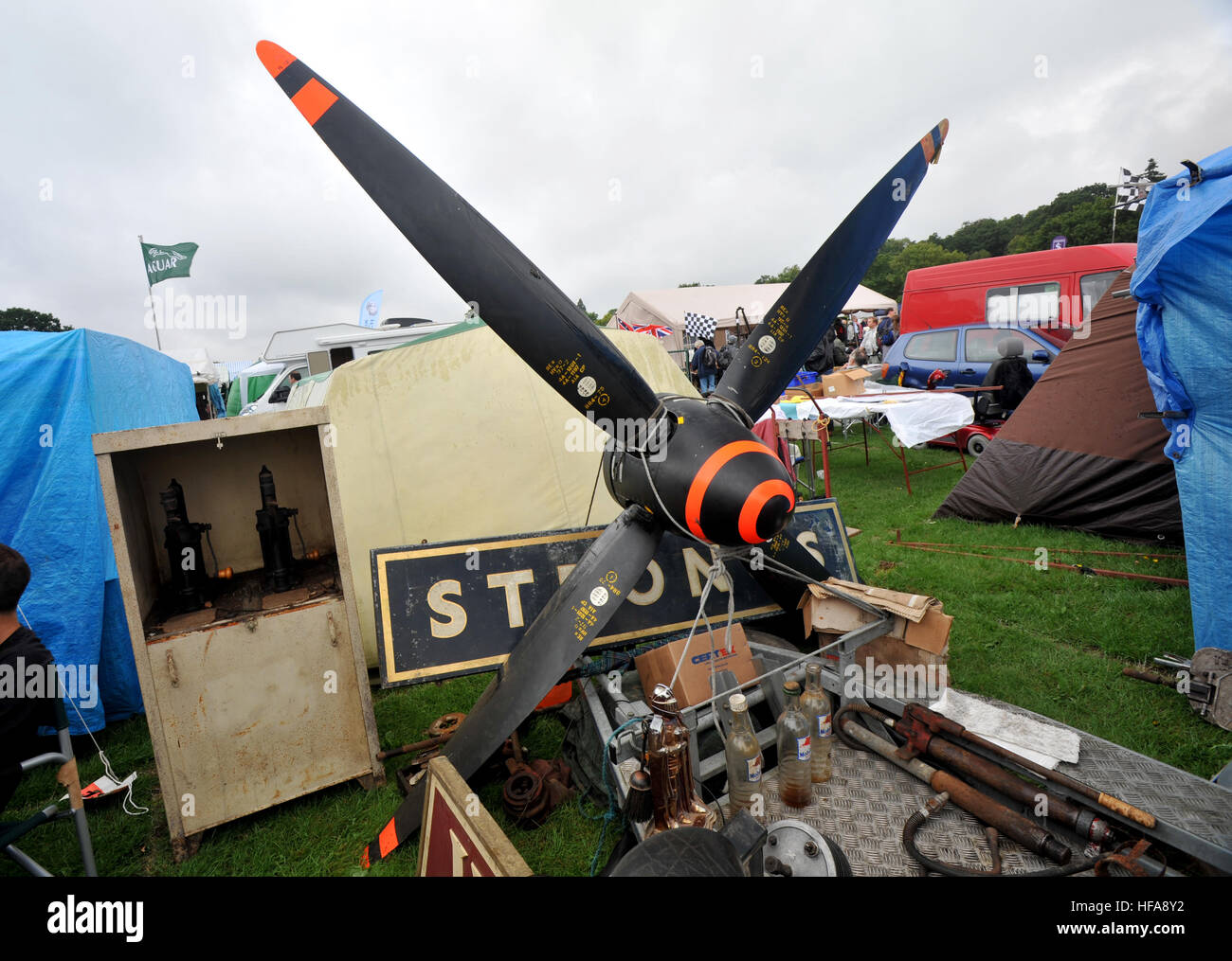 Classic car owners look through stalls of rare parts and automobilia at ...