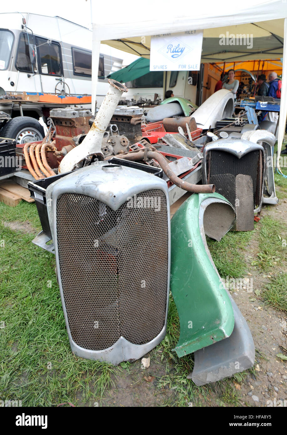 Classic car owners look through stalls of rare parts and automobilia at ...