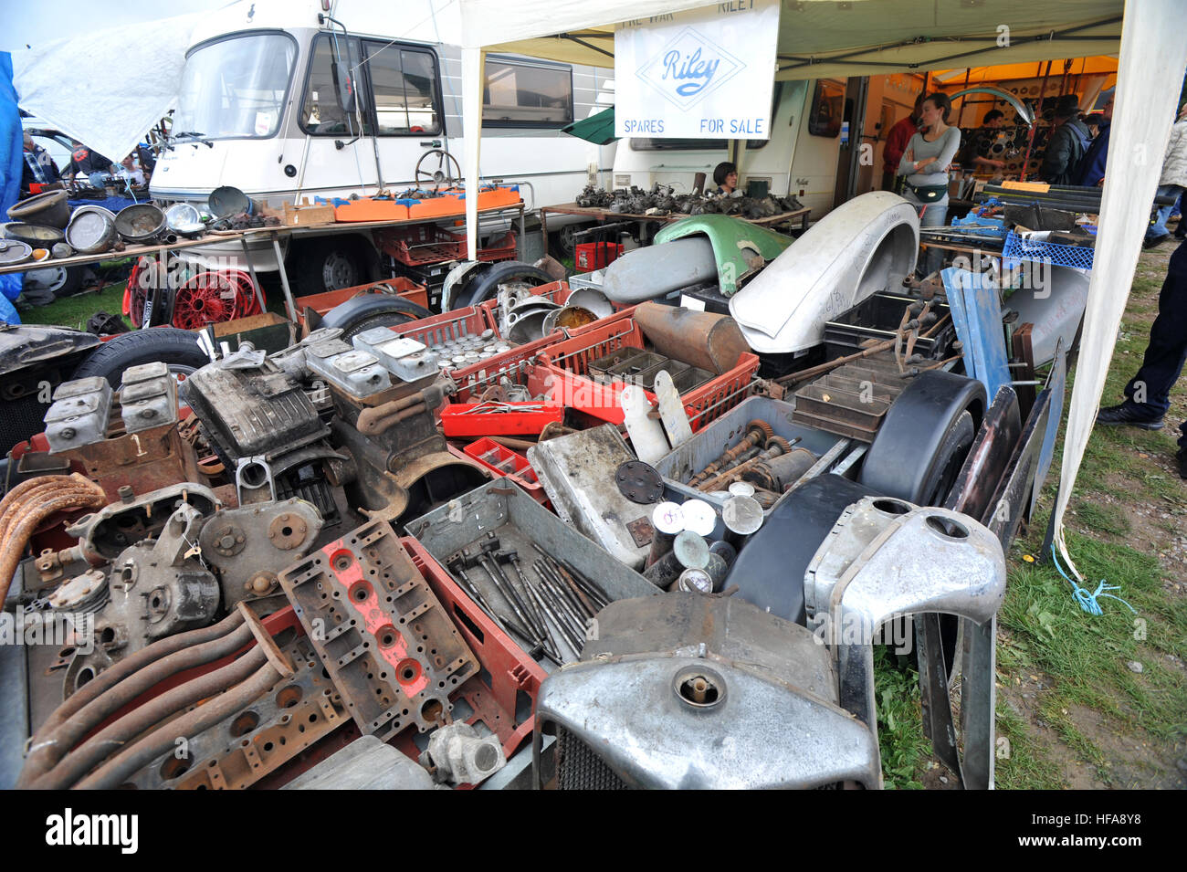 Classic car owners look through stalls of rare parts and automobilia at ...