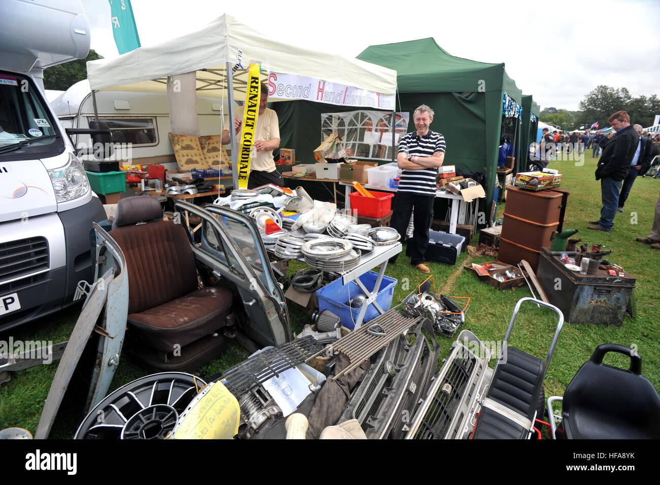 Classic car owners look through stalls of rare parts and automobilia at ...
