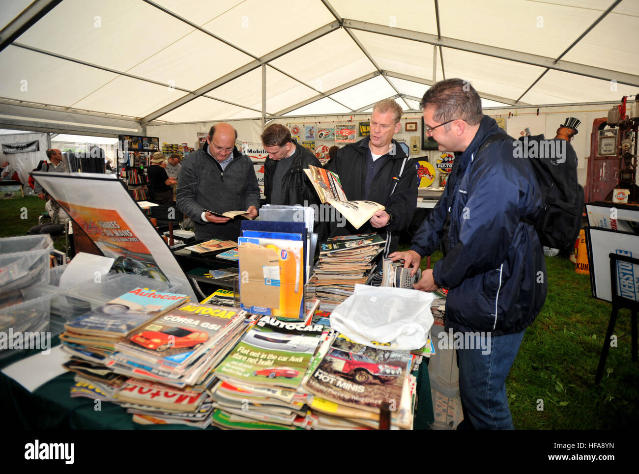 Classic car owners look through stalls of rare parts and automobilia at ...
