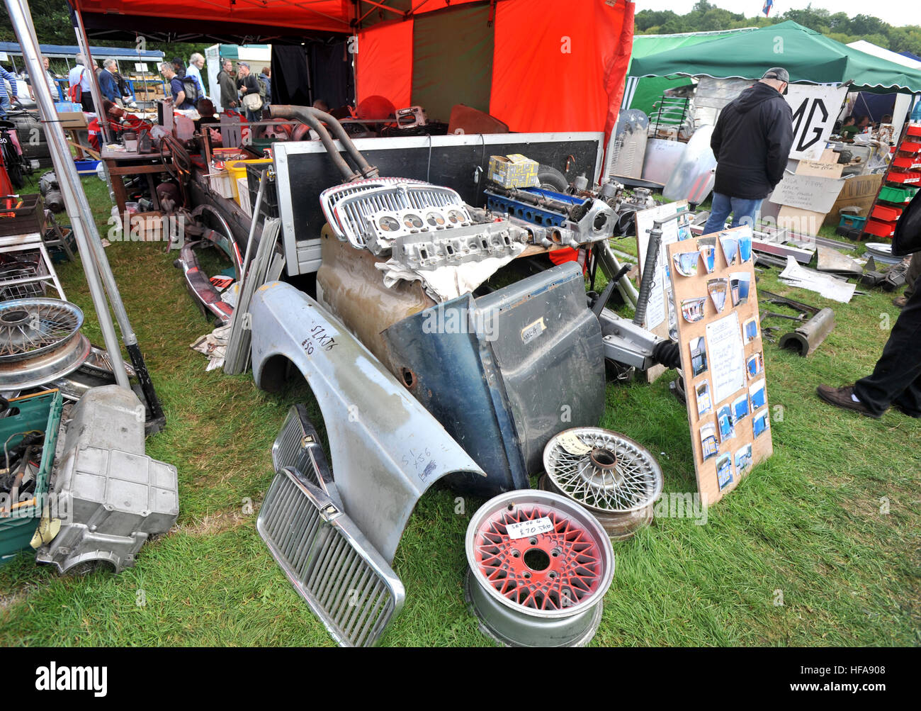 Classic car owners look through stalls of rare parts and automobilia at ...