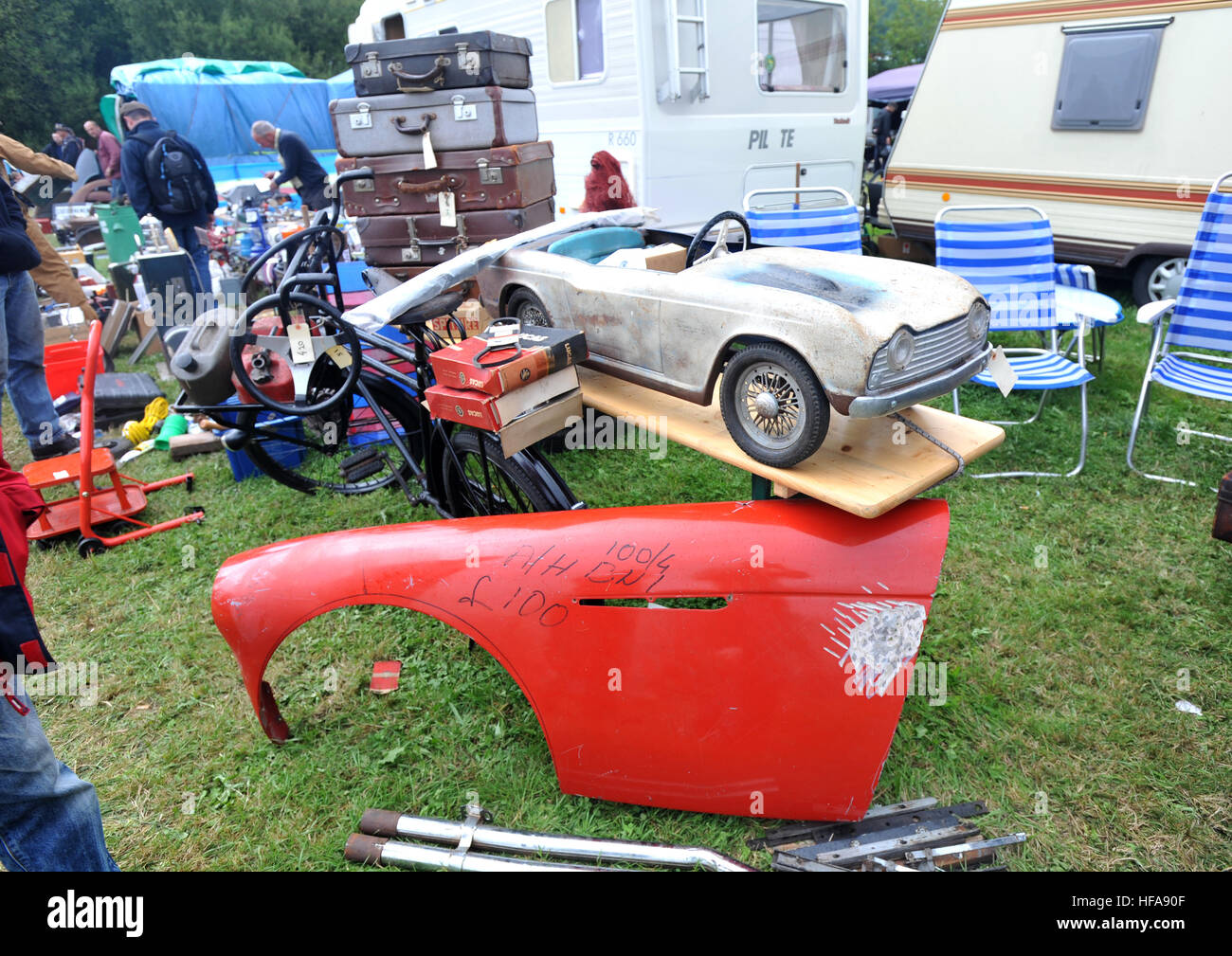 Classic car owners look through stalls of rare parts and automobilia at ...