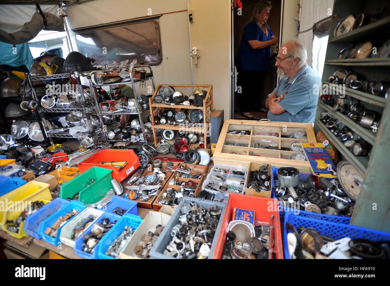 Classic car owners look through stalls of rare parts and automobilia at ...