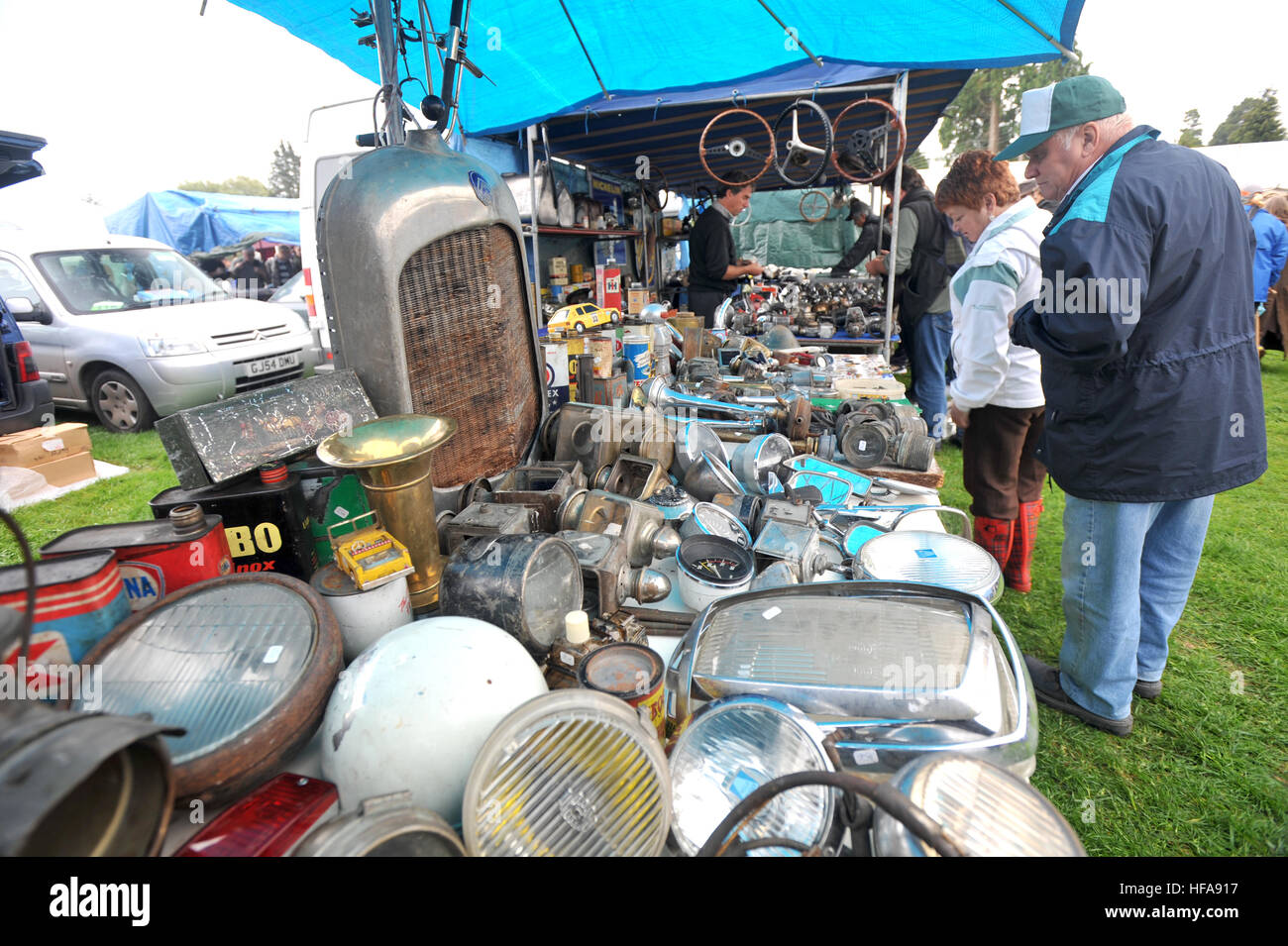 Classic car owners look through stalls of rare parts and automobilia at ...