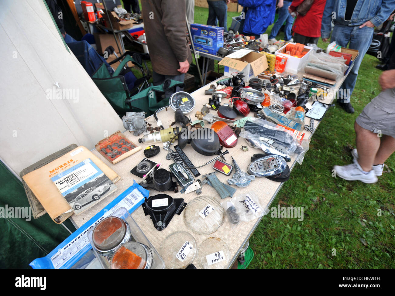 Classic car owners look through stalls of rare parts and automobilia at ...