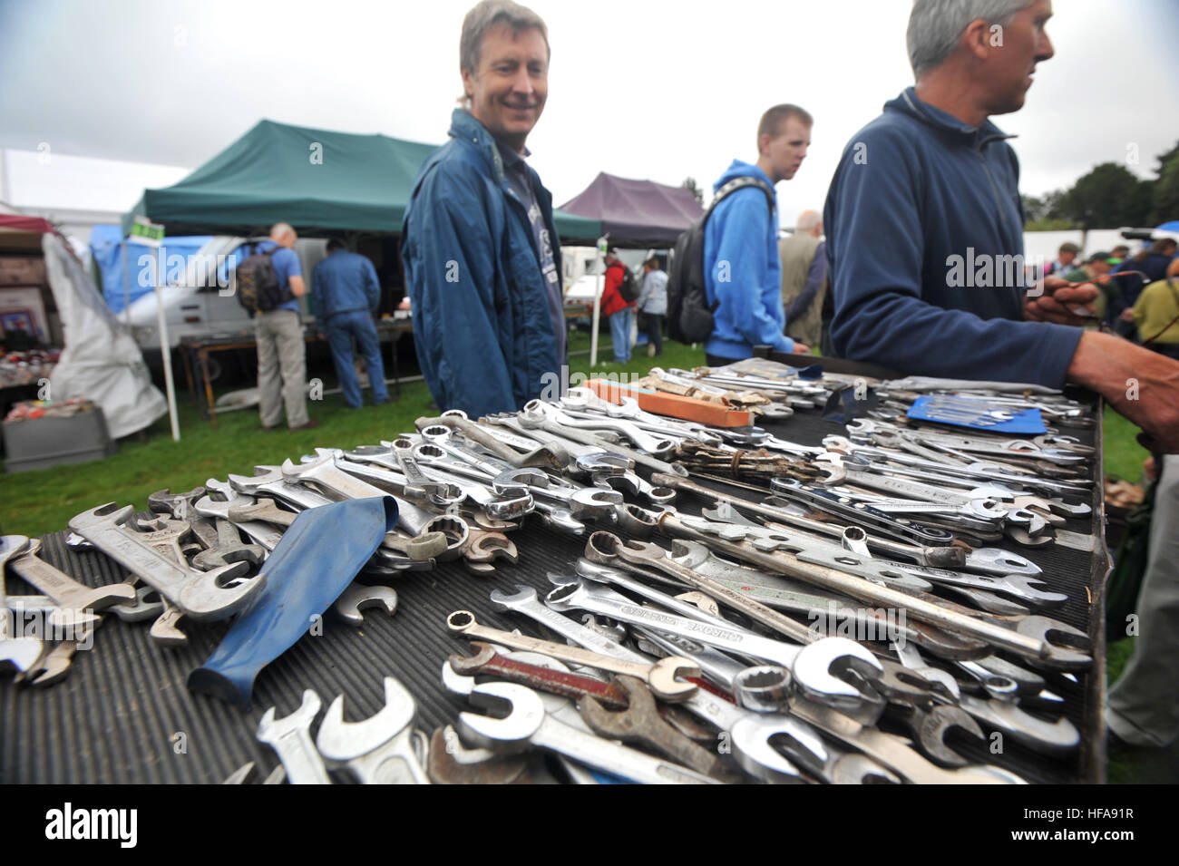 Classic car owners look through stalls of rare parts and automobilia at ...