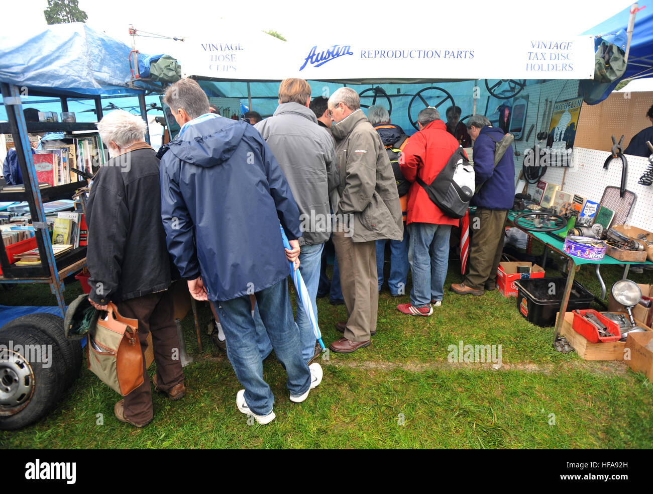 Classic car owners look through stalls of rare parts and automobilia at ...