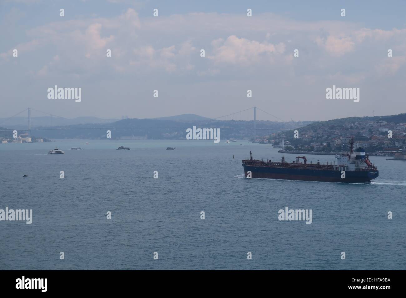 Large cargo container ship passing through Bosphorus, in Istanbul ...