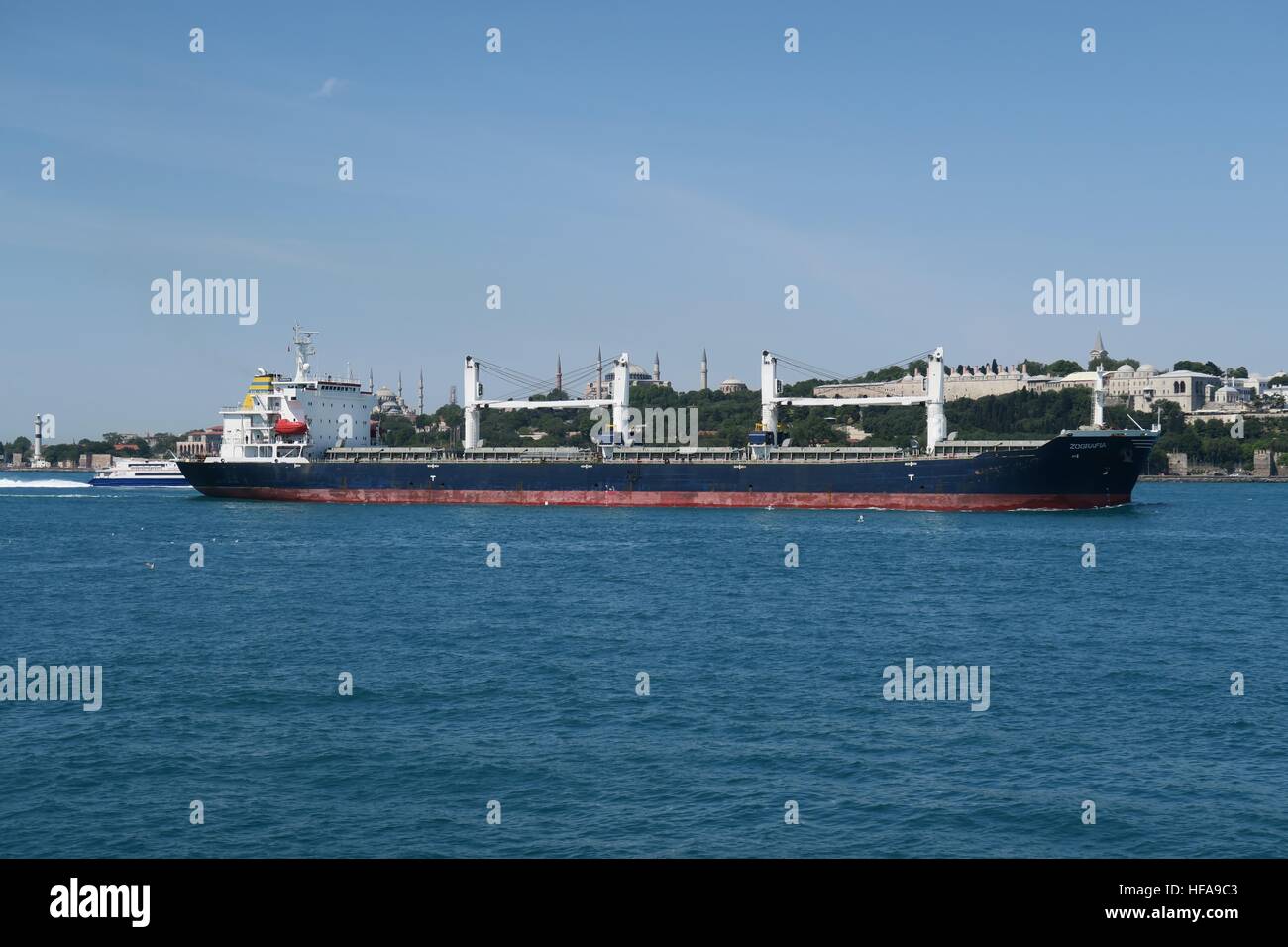 Large cargo container ship passing through Bosphorus, in Istanbul ...