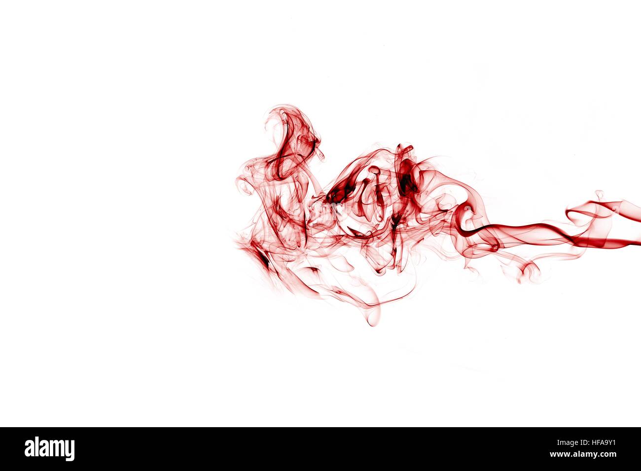 Red smoke on white background Stock Photo - Alamy
