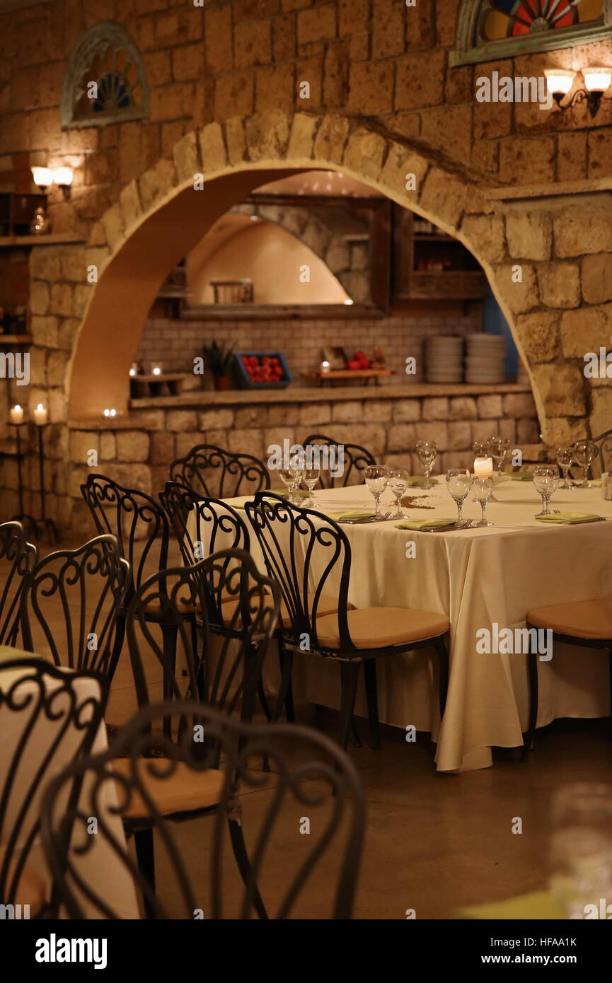 Atmospheric lit restaurant interior Stock Photo - Alamy