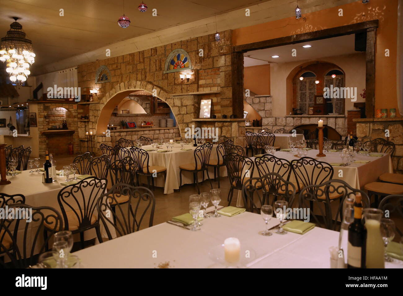 Atmospheric lit restaurant interior Stock Photo - Alamy