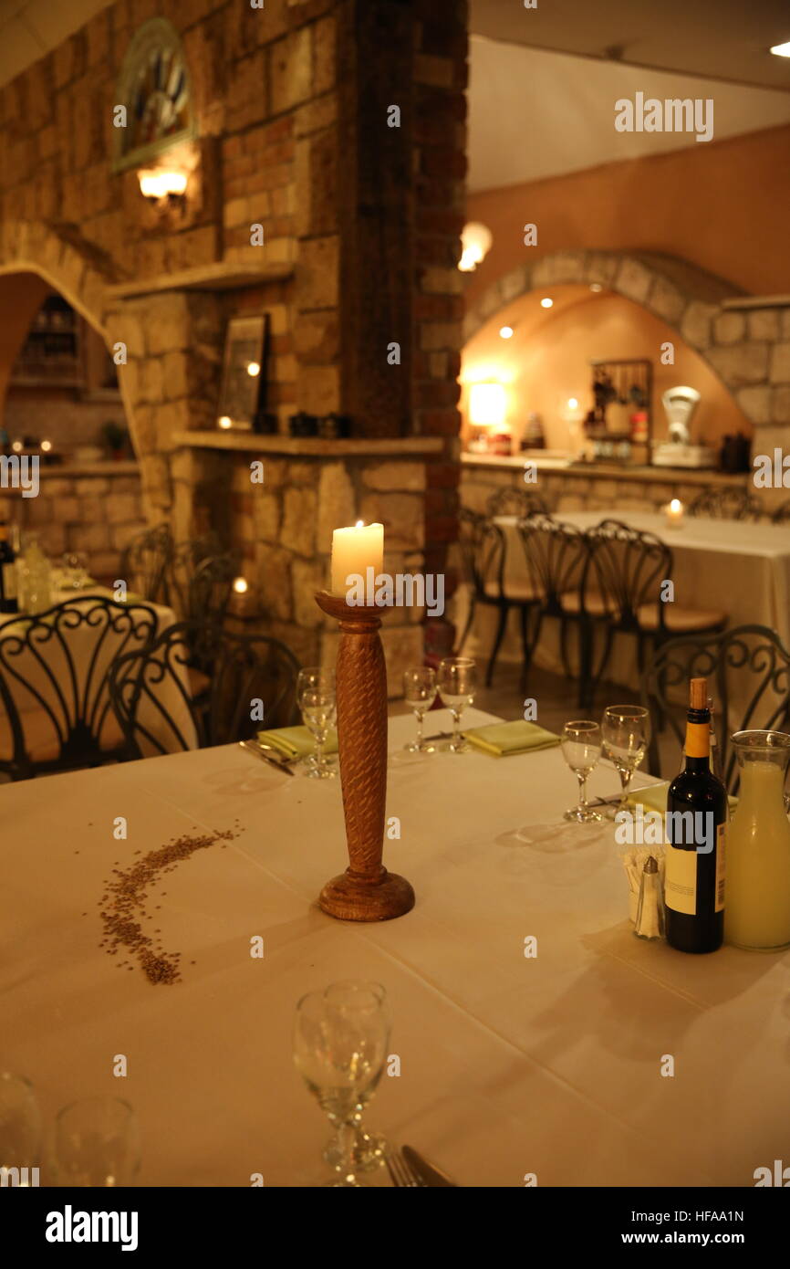 Atmospheric lit restaurant interior Stock Photo - Alamy