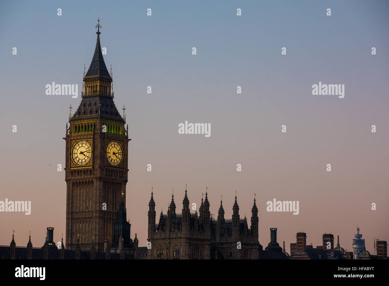 The sun sets behind Big Ben over the central London skyline Stock Photo ...