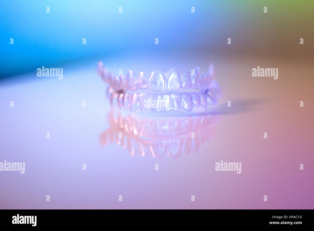 Denture plastic dental retainer to align teeth Stock Photo - Alamy