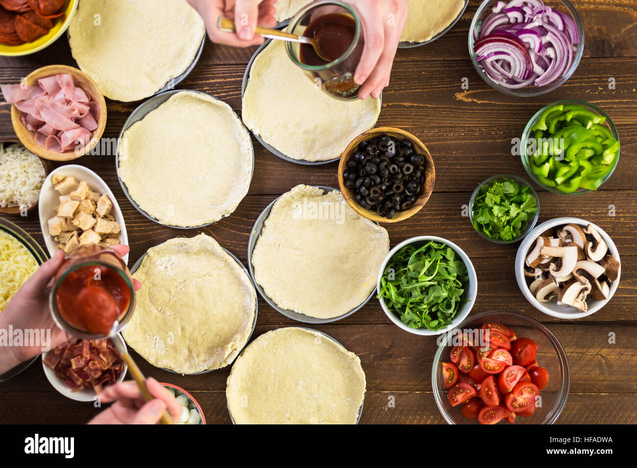 Hands preparing pizza crust hi-res stock photography and images - Alamy