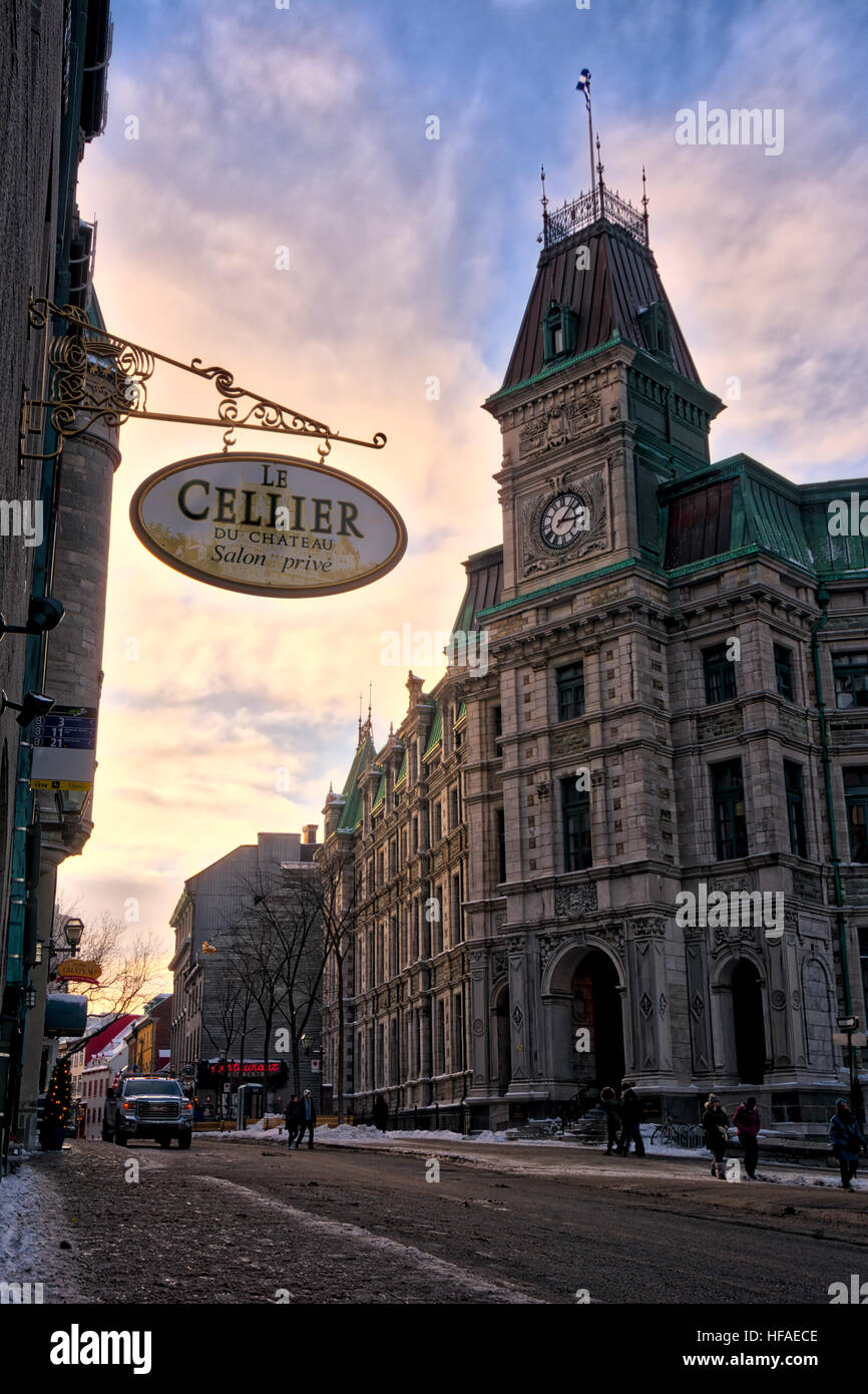 Historic Quebec building in the winter sunset Stock Photo - Alamy