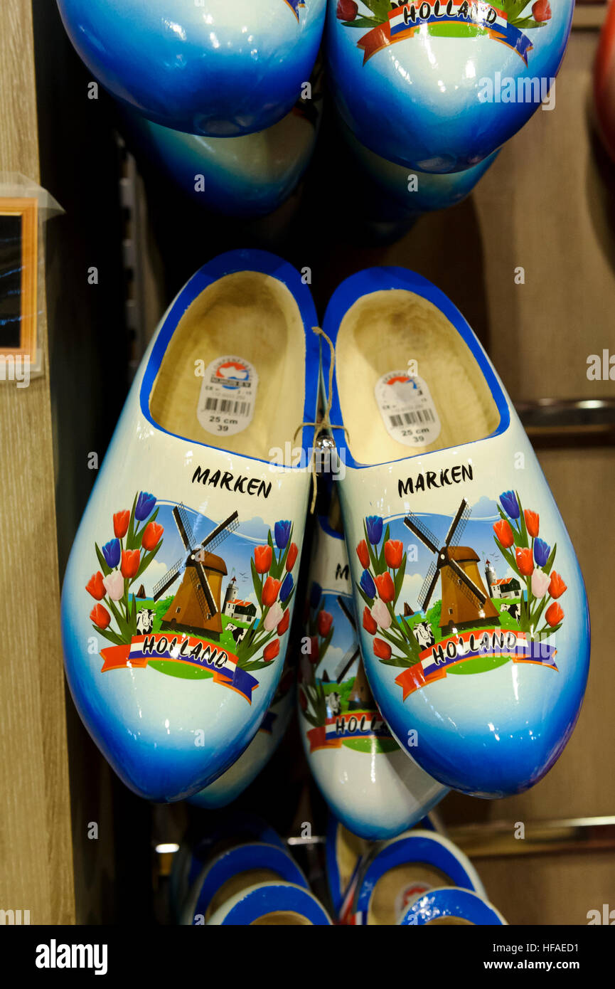 Colourful wooden clogs with windmill designs on display in a shop in ...
