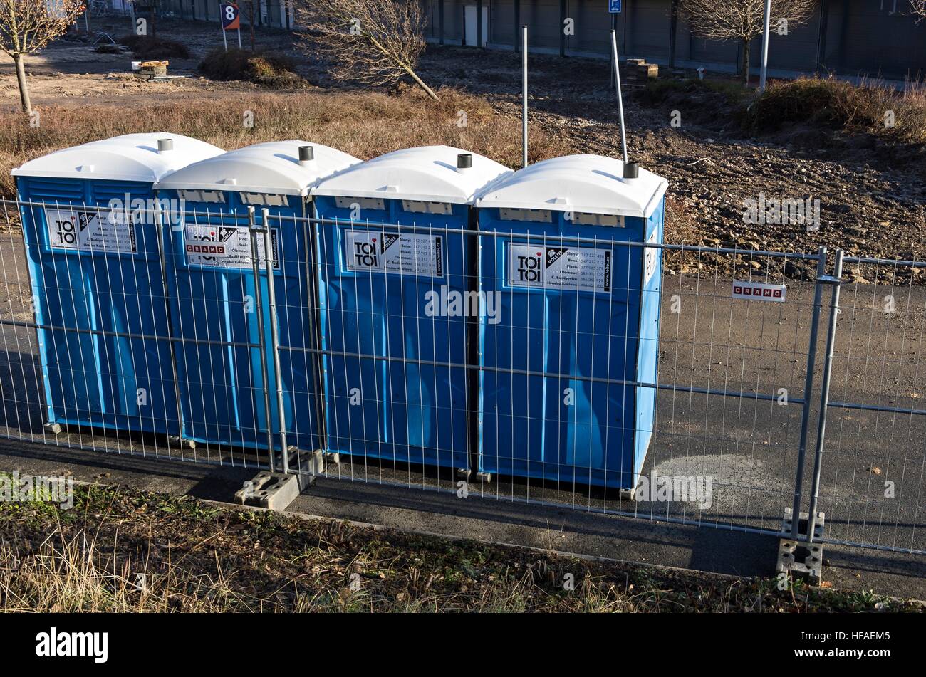 Portable toilet, quaternion, blue, TOI TOI company Stock Photo - Alamy