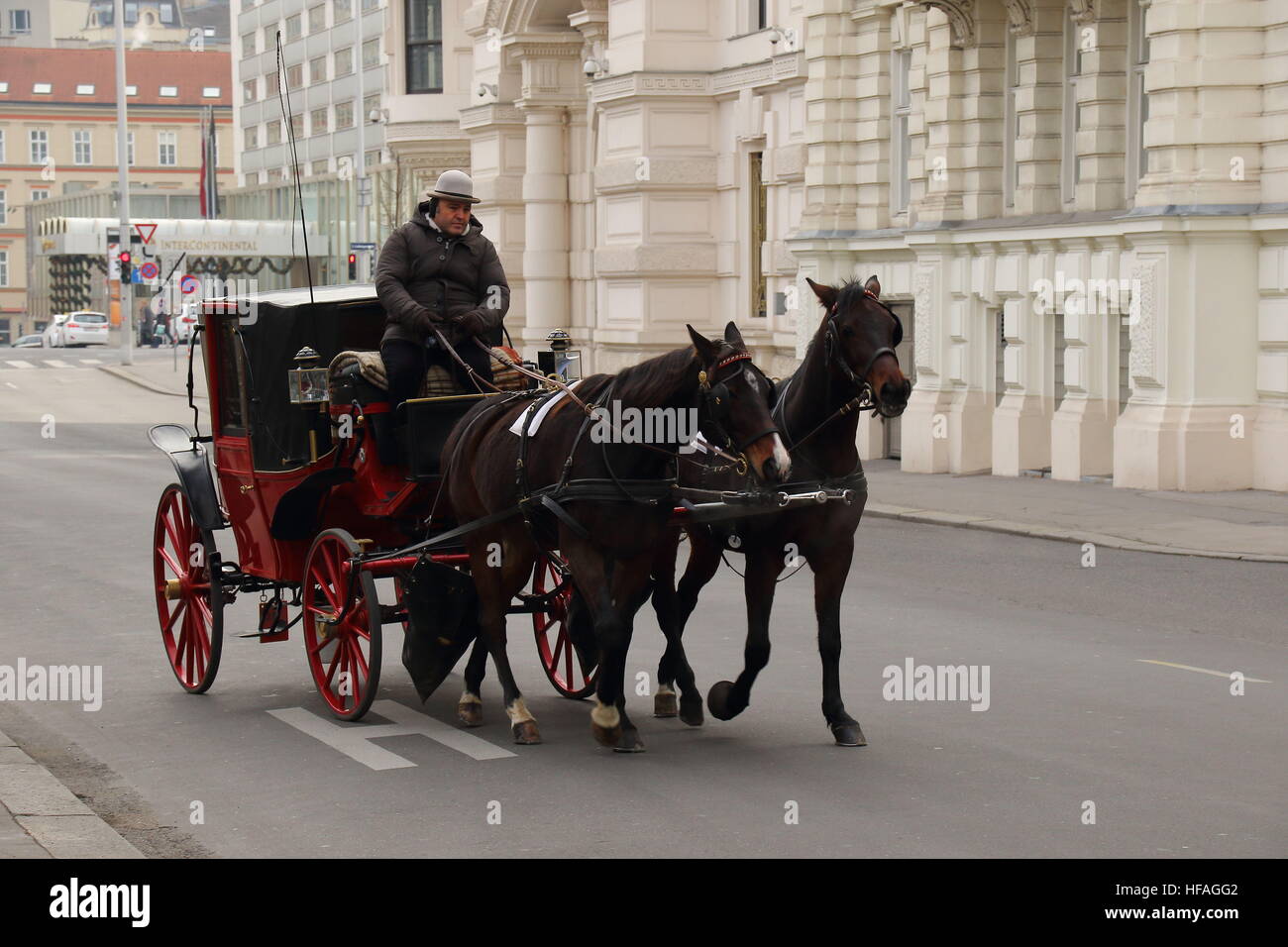 Horse drawn carriage in Vienna Austria through the streets of the city ...