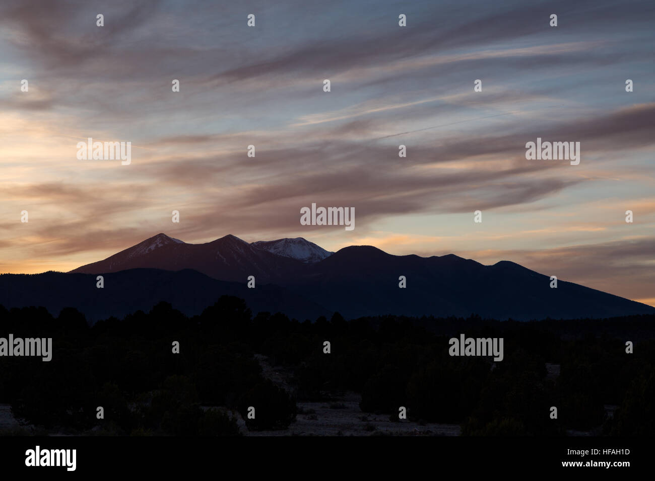 A colorful sunset east of Flagstaff above the San Francisco Peaks ...