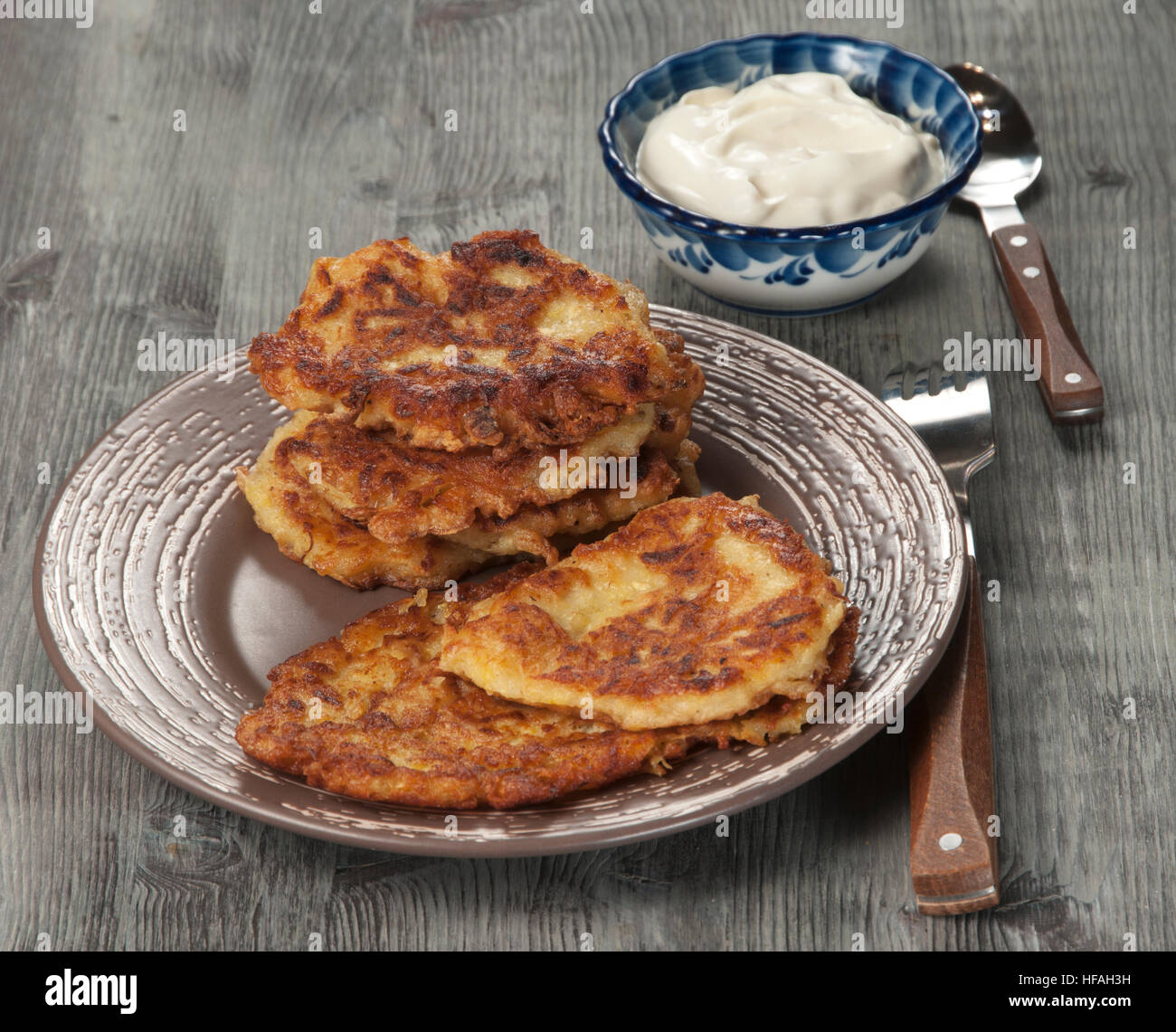 Marrow zuccini flapjack on timber board, close up Stock Photo - Alamy