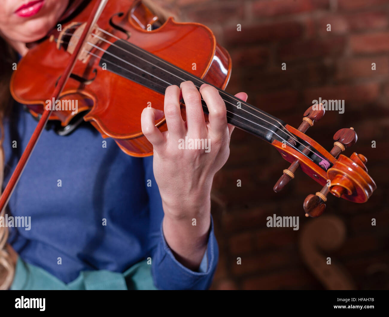 Woman playing music on wooden hi-res stock photography and images - Alamy