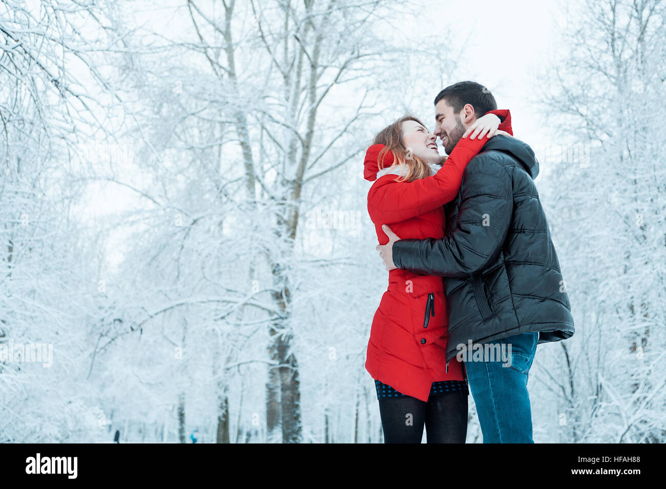 Young couple resting in park, embrace and smilling of loving Stock ...