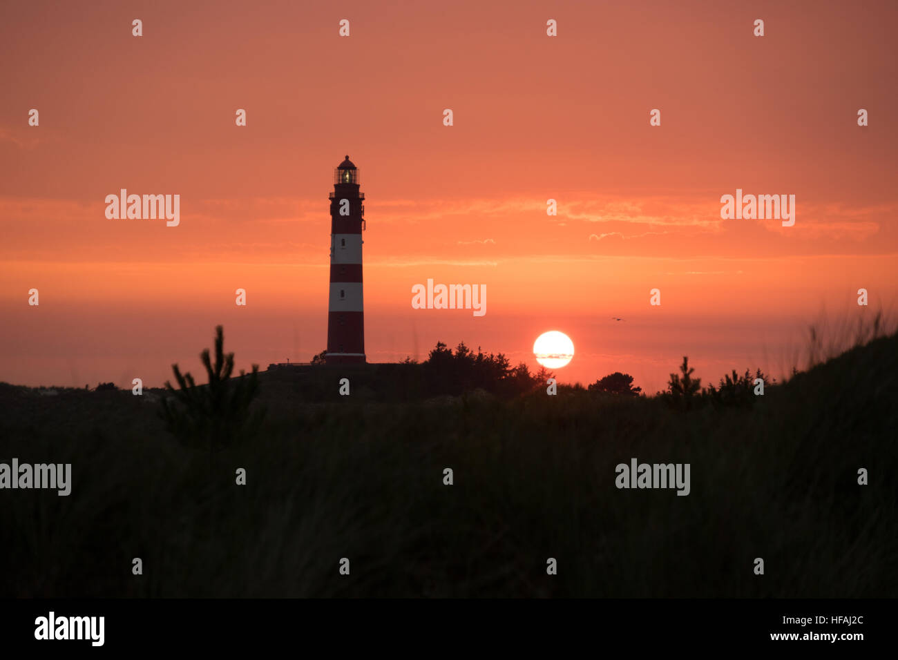 Lighthouse with sun hi-res stock photography and images - Alamy